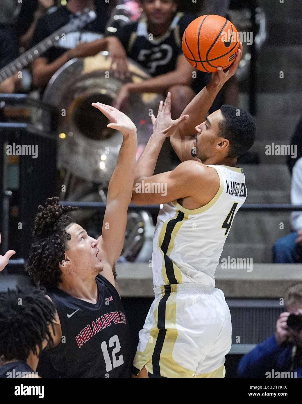 Purdue forward Trey Kaufman-Renn (4) shoots over UIndy forward Shaun ...