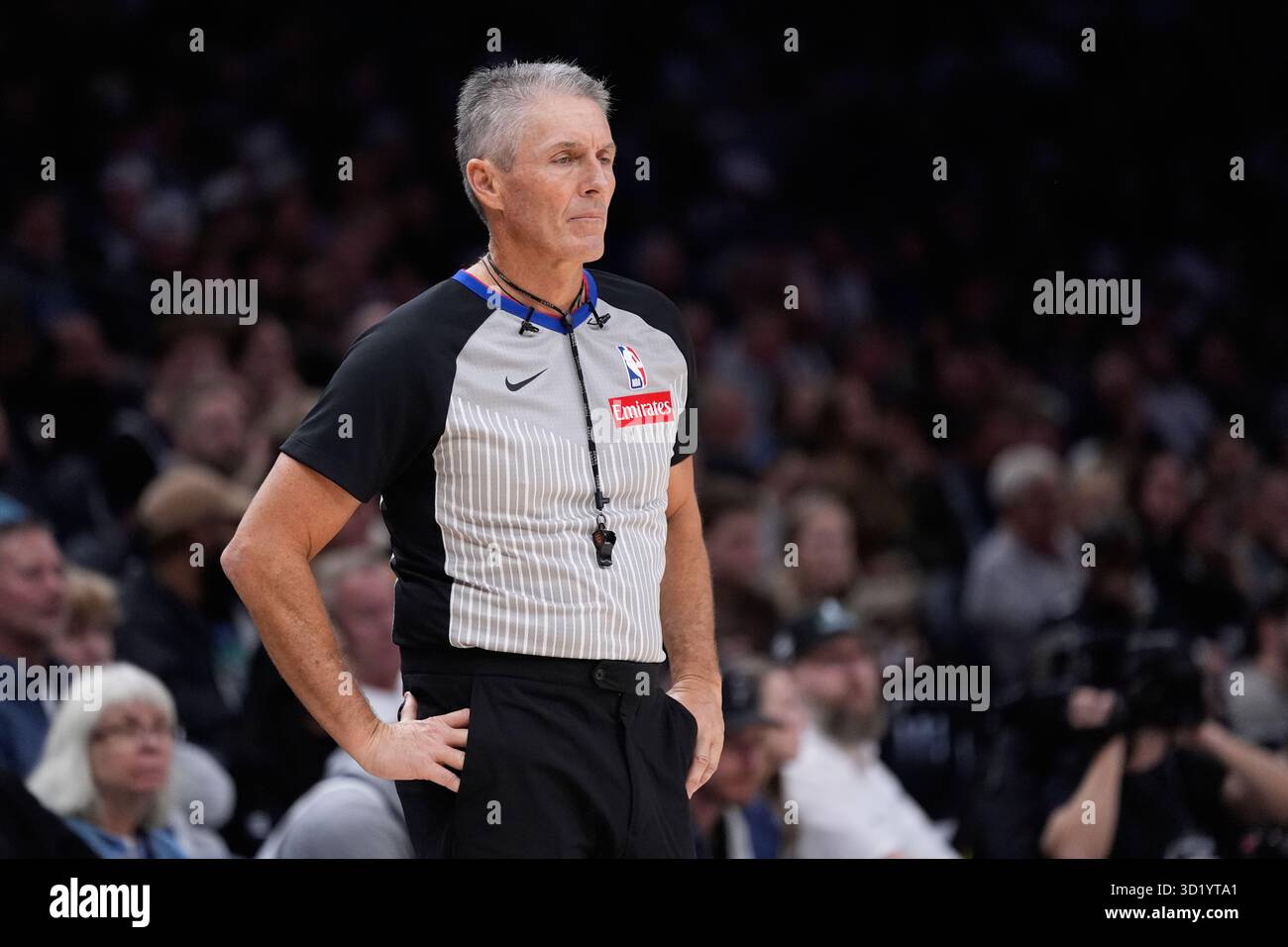 Referee Scott Foster stands on the court during the second half of an ...