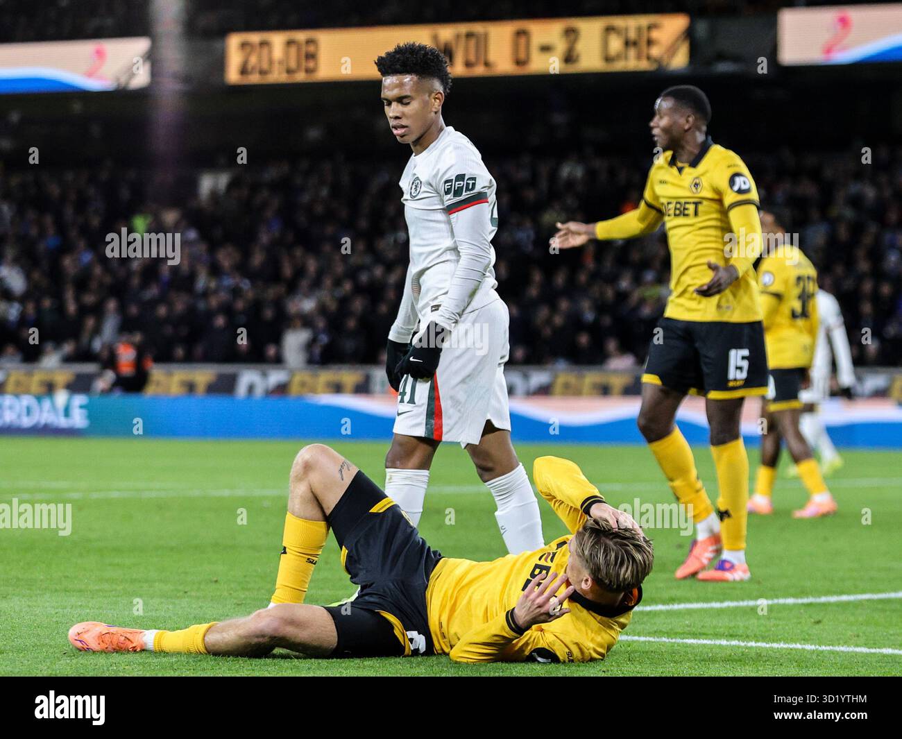 David Moller Wolfe (6 Wolves) is hurt after Estevao (41 Chelsea ...