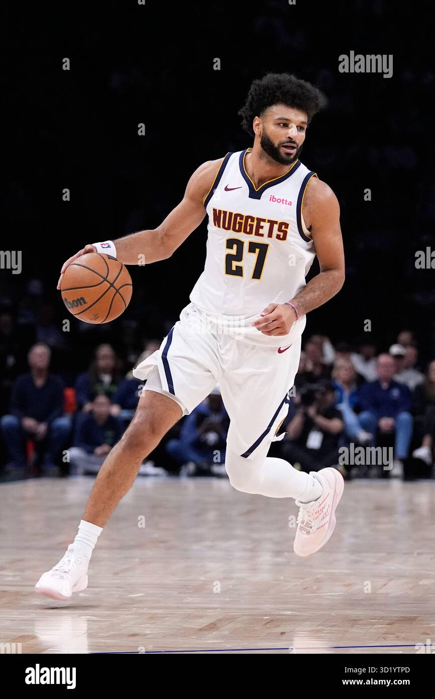 Denver Nuggets guard Jamal Murray (27) dribbles down the court during ...
