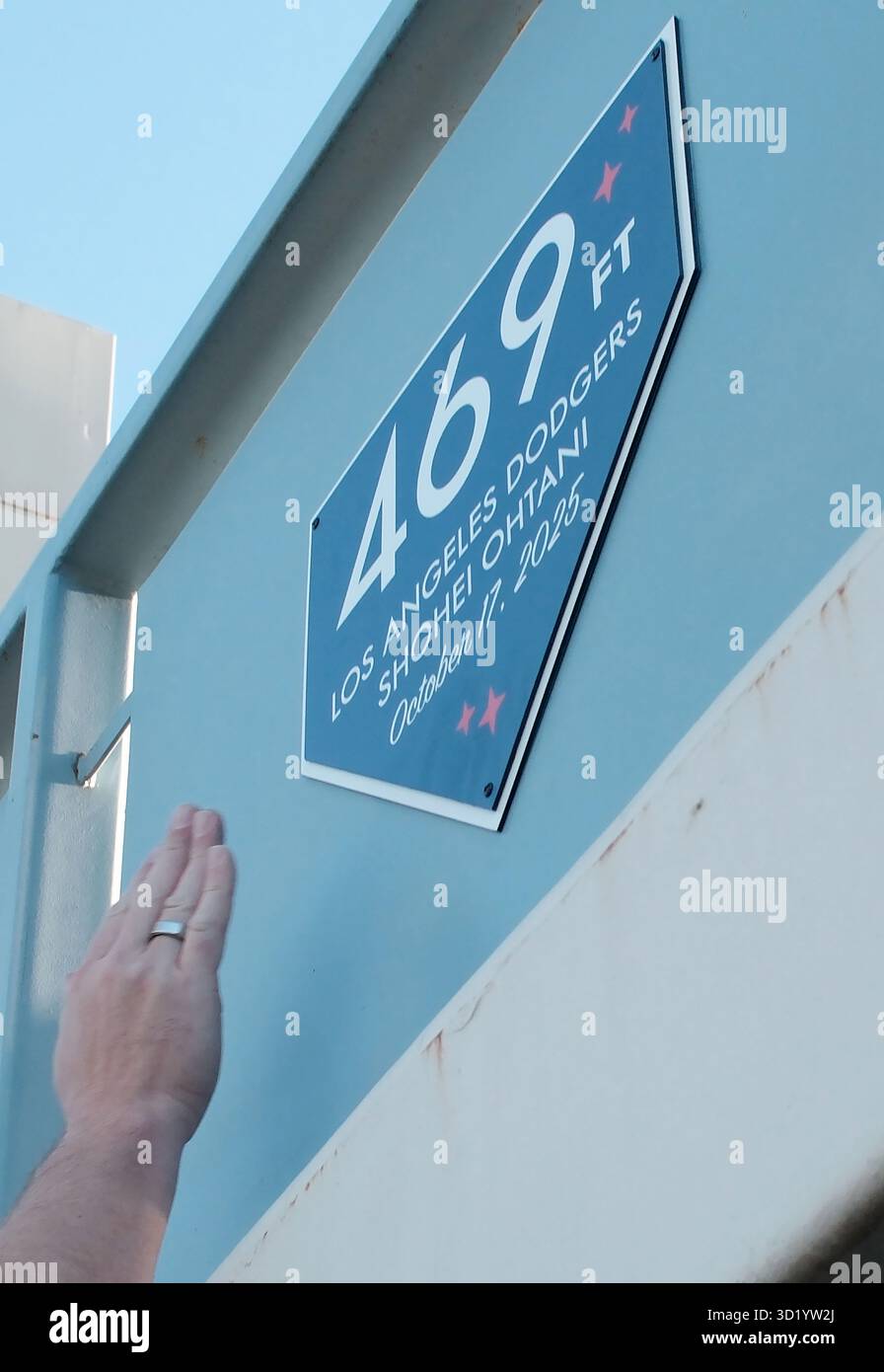 A photo shows a memorial plaque at Dodger Stadium in Los Angeles, CA ...
