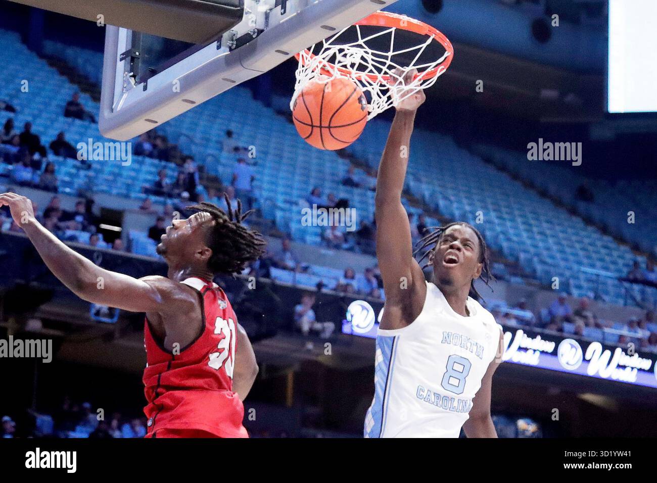 North Carolina forward Caleb Wilson (8) dunks over Winston-Salem State ...