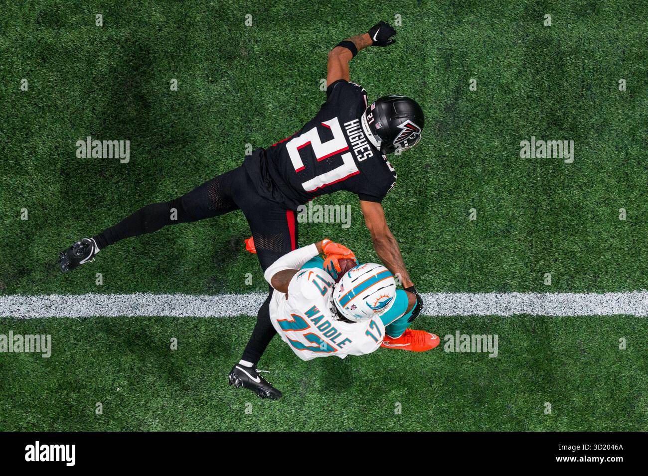 Miami Dolphins wide receiver Jaylen Waddle (17) dodges Atlanta Falcons ...