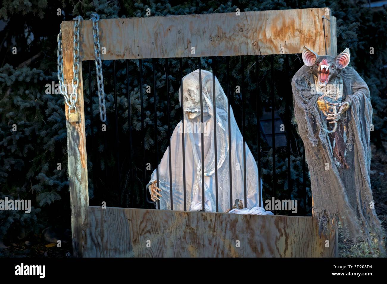 Spooky Halloween display featuring a skeleton ghost figure in a wooden ...