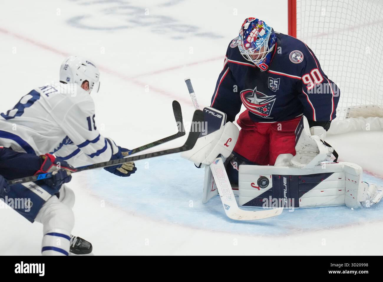 Toronto Maple Leafs center Steven Lorentz (18) shoots on Columbus Blue ...
