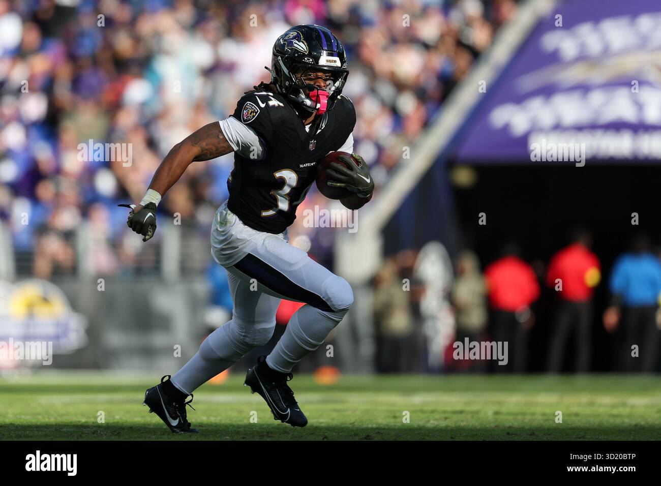 Baltimore Ravens running back Keaton Mitchell runs the ball during the ...