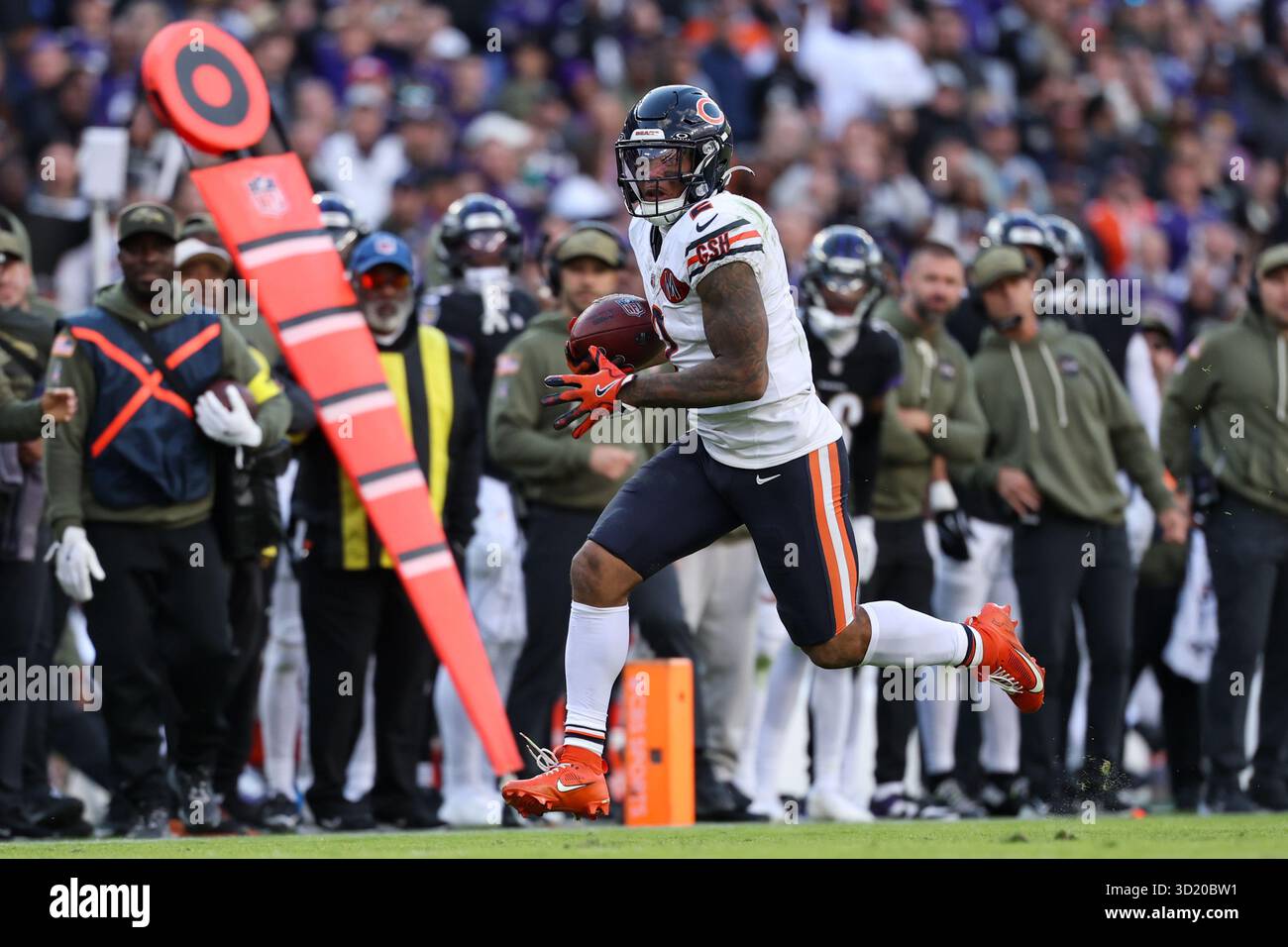 Chicago Bears wide receiver DJ Moore runs with the ball after catching ...