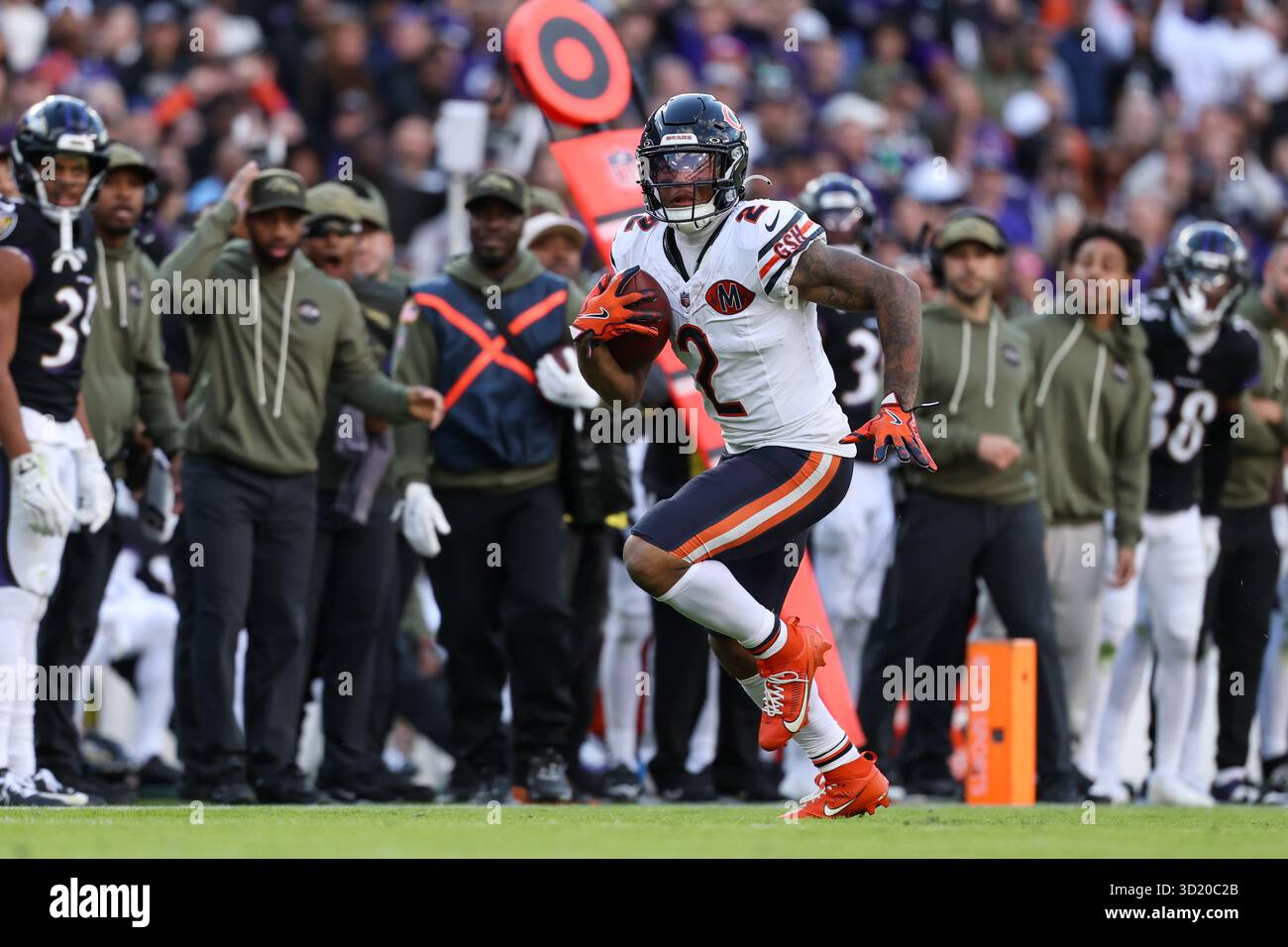 Chicago Bears wide receiver DJ Moore runs with the ball after catching ...