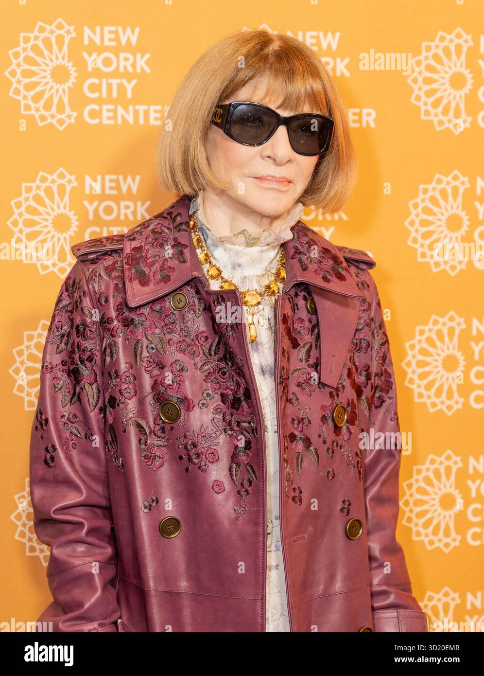 Anna Wintour wearing coat by Burberry and dress by Alexander McQueen ...