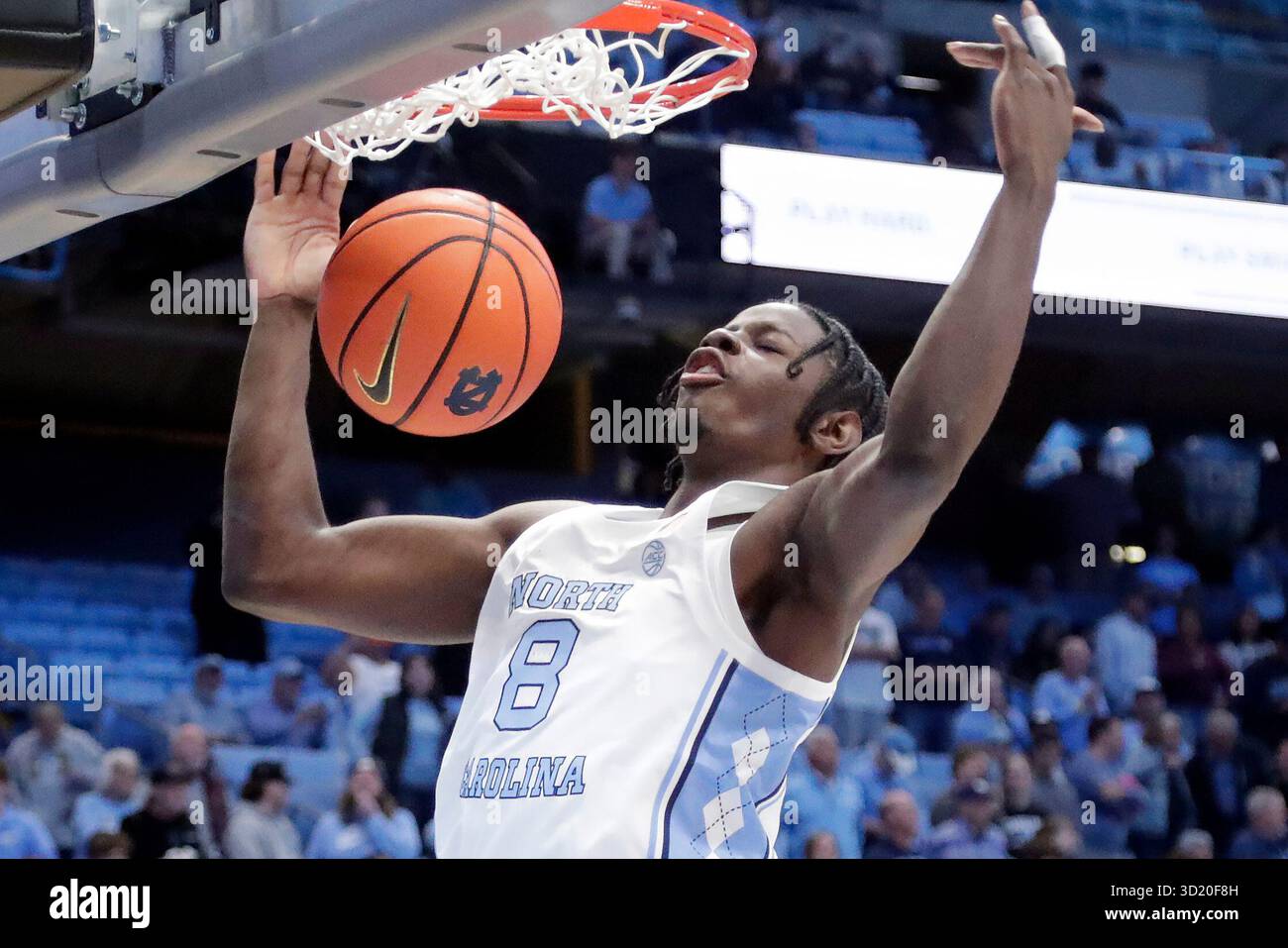 North Carolina forward Caleb Wilson (8) dunks against Winston-Salem State during the first half ...