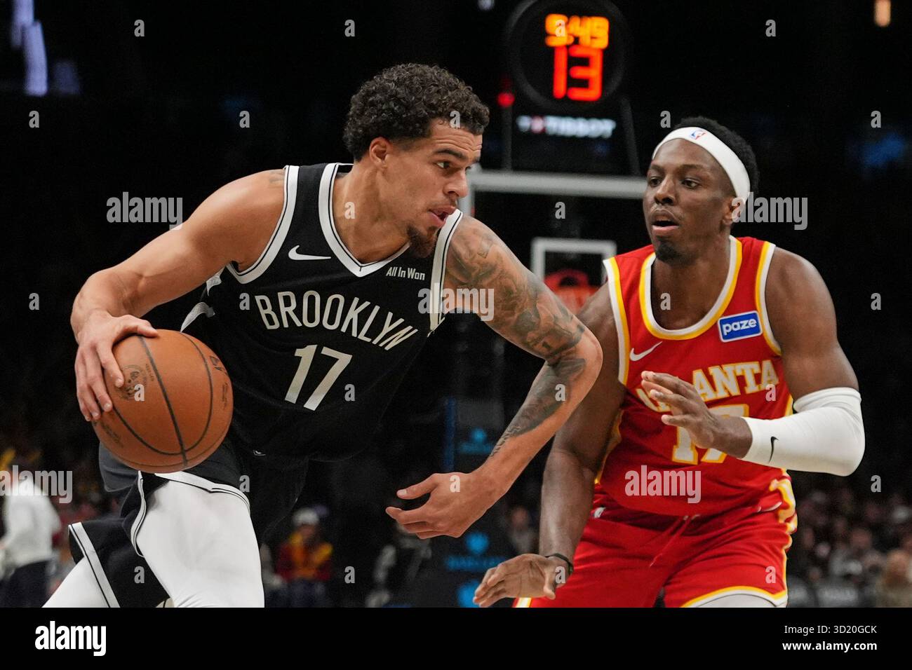 Brooklyn Nets' Michael Porter Jr. (17) drives past Atlanta Hawks ...