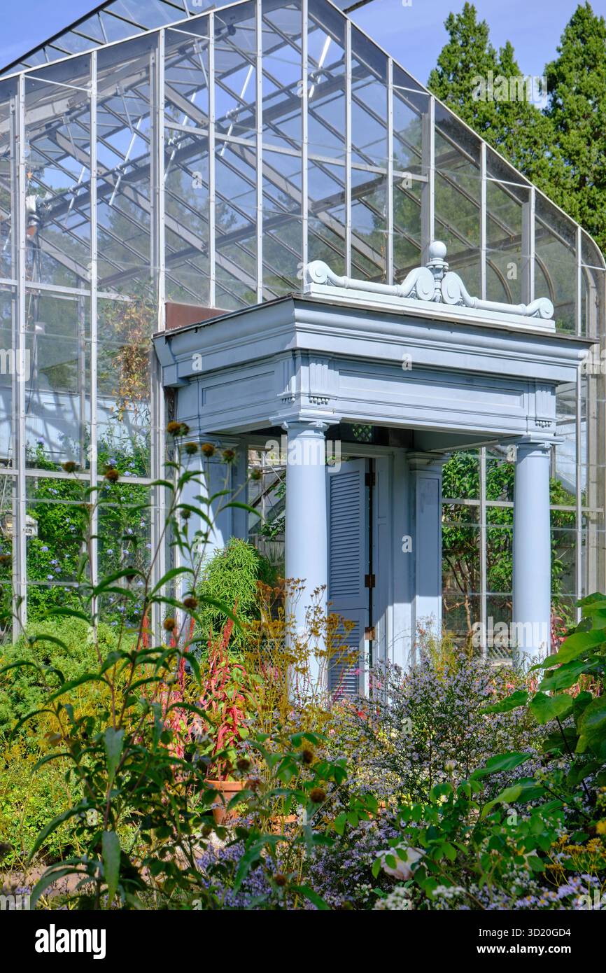 Elegant entrance to a botanical greenhouse featuring classical ...