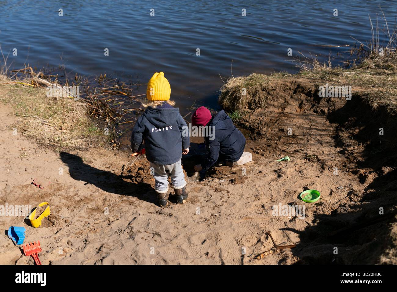 Children enjoy playtime riverbank hi-res stock photography and images ...