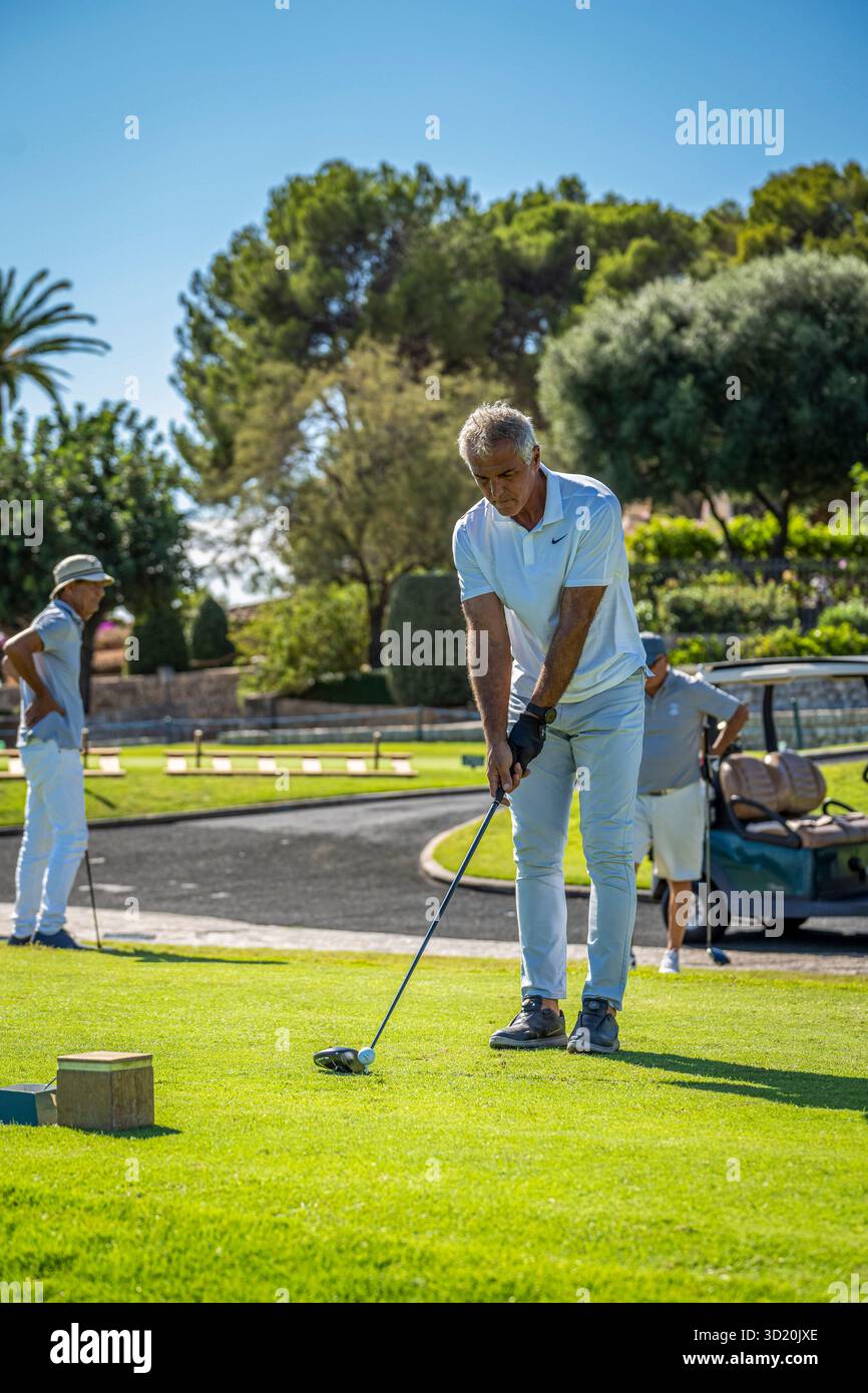 Former Barcelona Football Club player Miguel Ángel Nadal playing golf ...