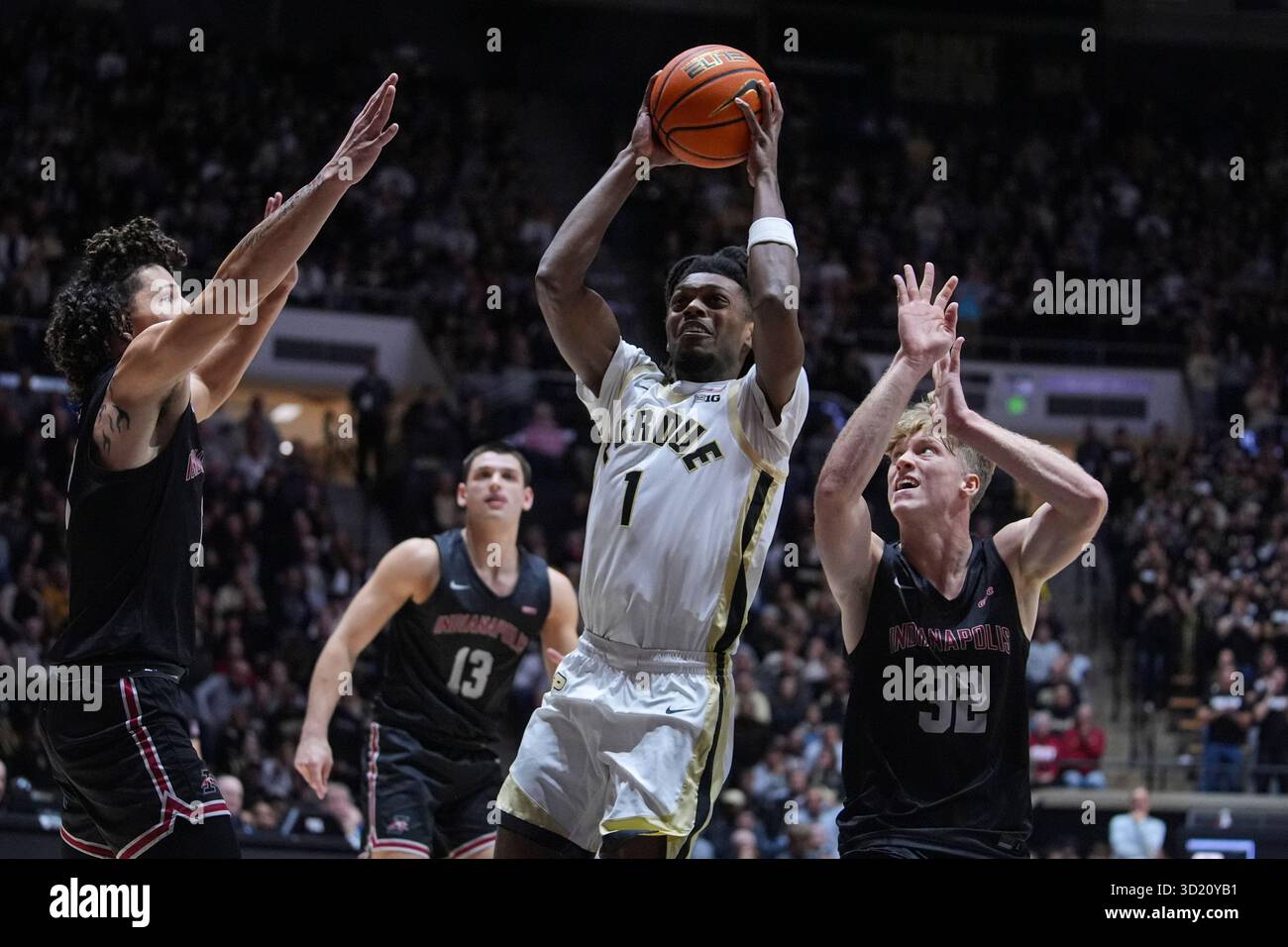 Purdue guard Antione West Jr. (1) shoots over UIndy guard Ethan Edwards ...