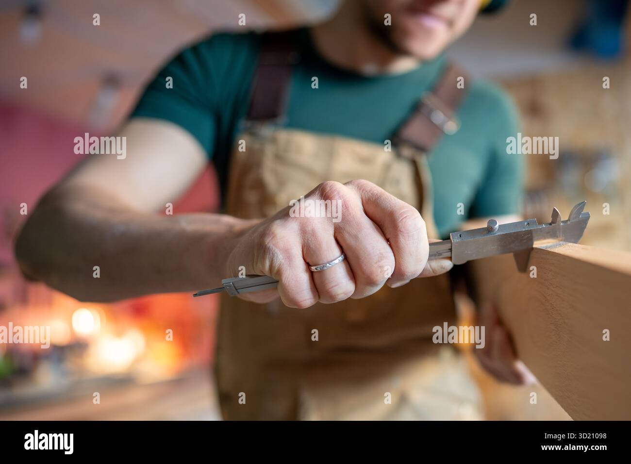 Focused carpenter hands measuring hi-res stock photography and images ...