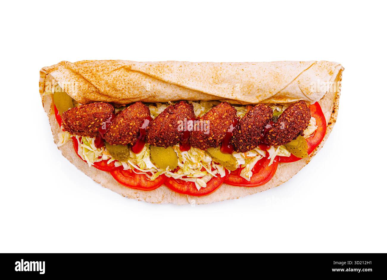 A falafel wrap is filled with crispy falafel balls, fresh slices of ...