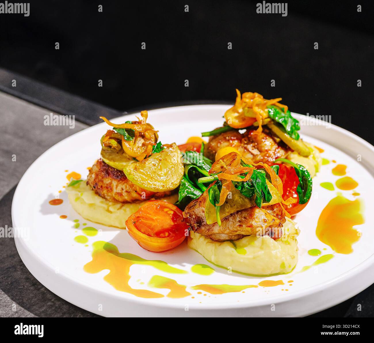 Deliciously plated dish featuring sauteed vegetables and protein in a ...