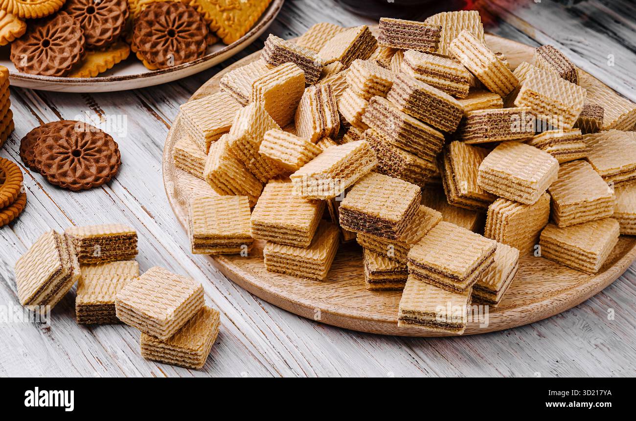 Various types of traditional cookies displayed on wooden plates with ...
