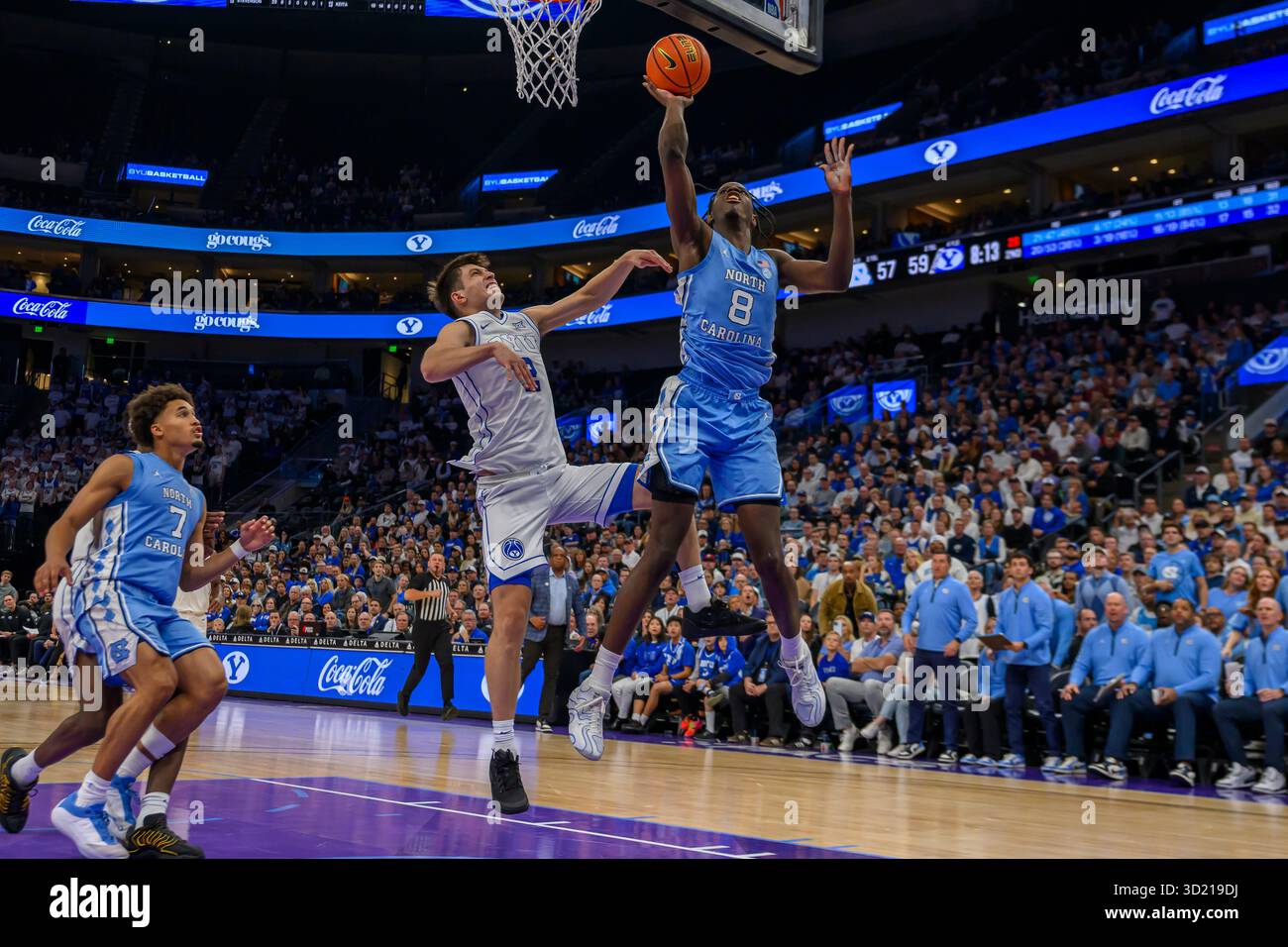 North Carolina forward Caleb Wilson (8) goes to the basket for a lay up ...