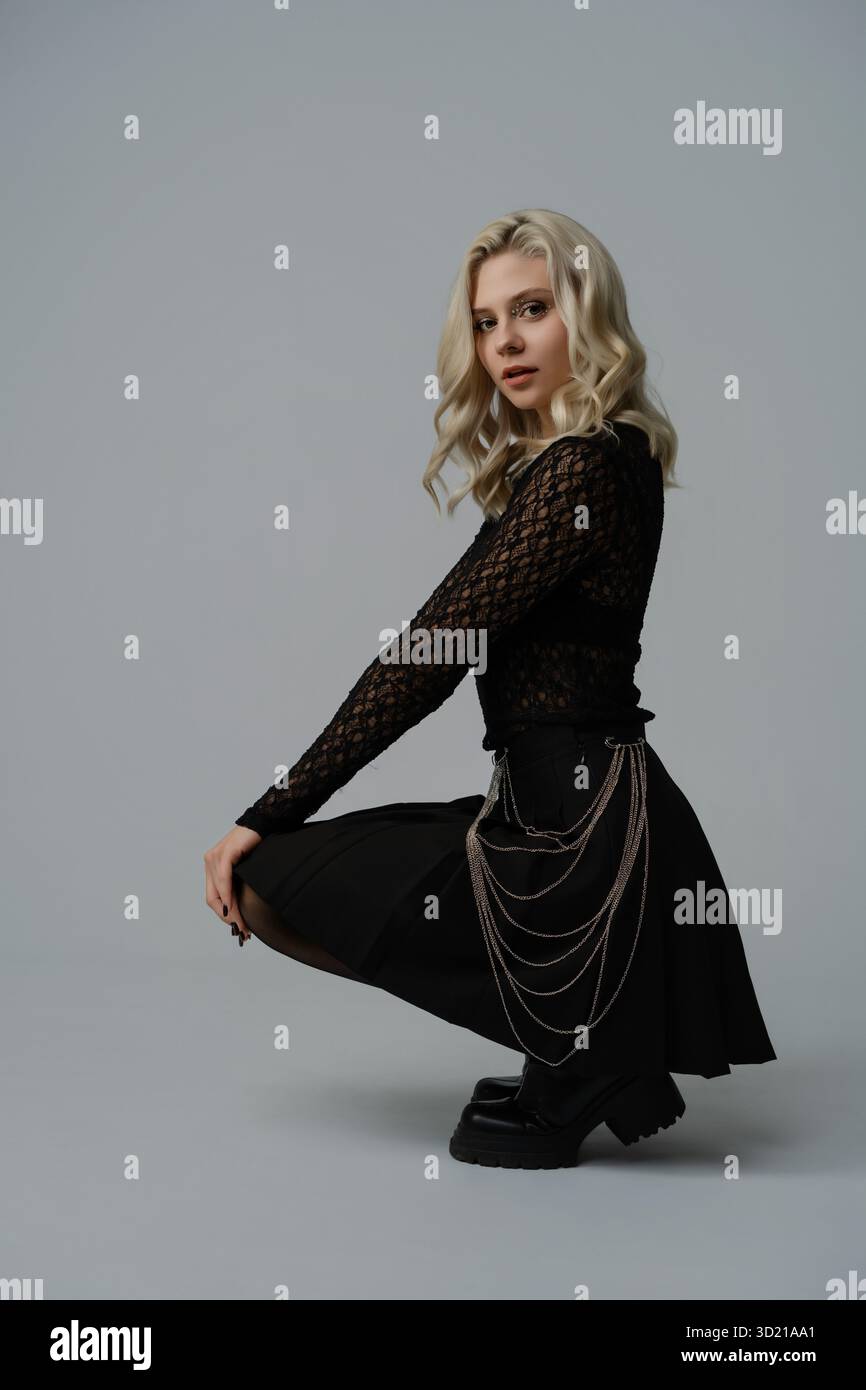 Stylish model poses gracefully hi-res stock photography and images - Alamy