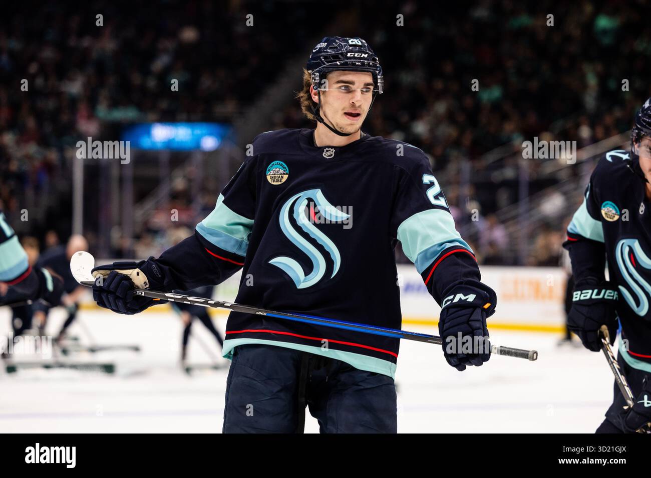 Seattle Kraken center Ryan Winterton looks on during an NHL hockey game ...