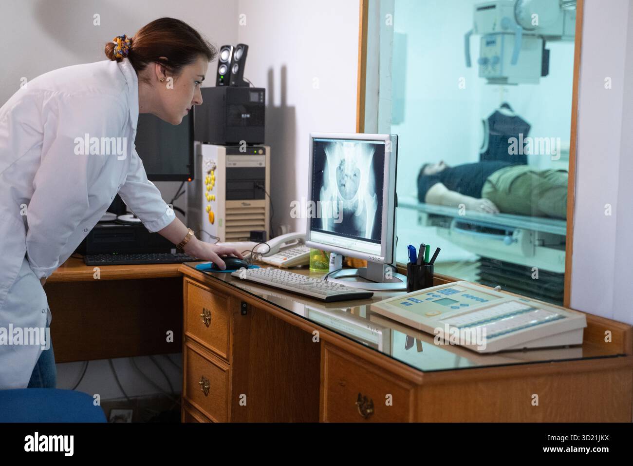 Radiologist Analyzing X-Ray Scans in a Medical Imaging Room Stock Photo ...