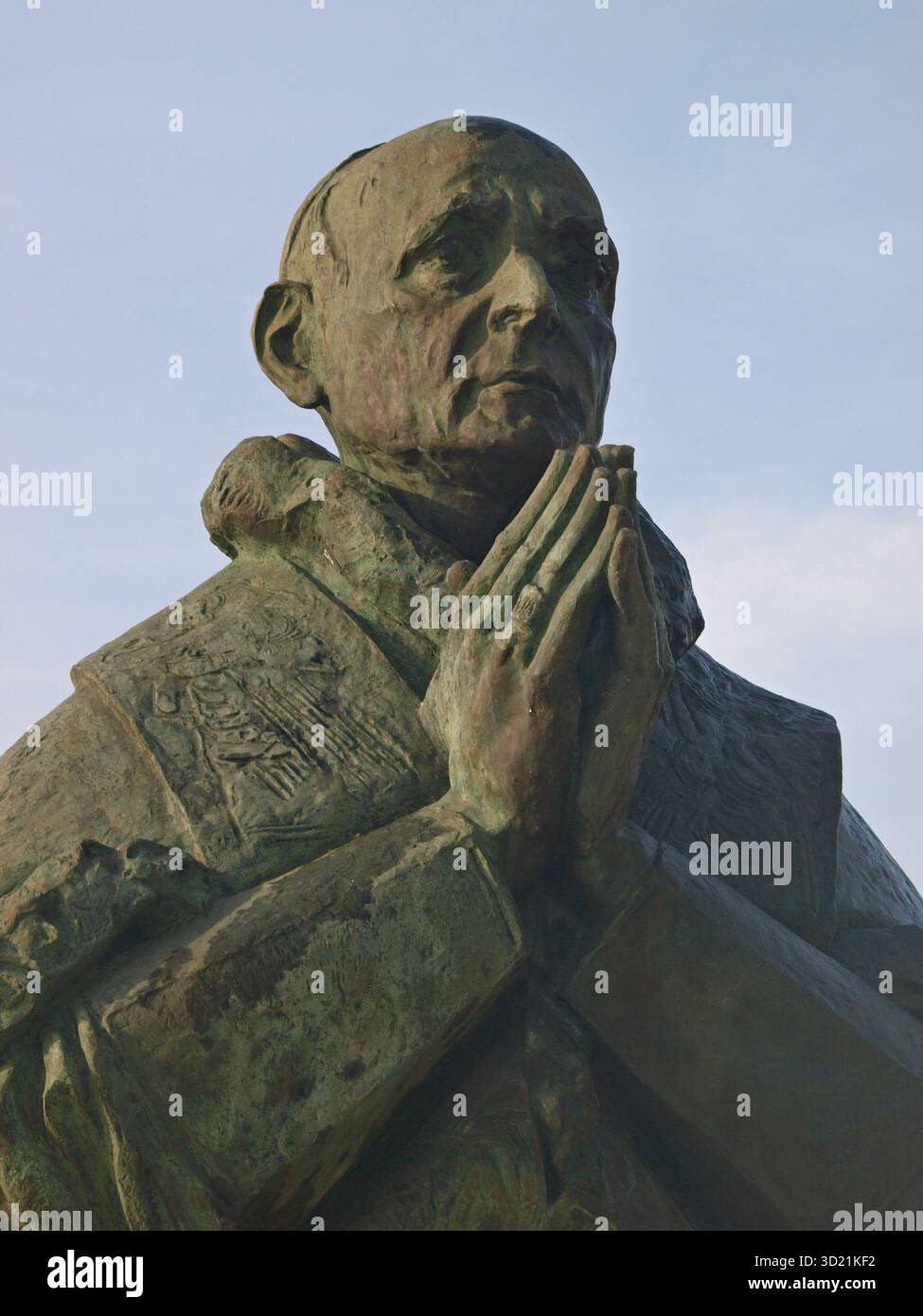 Bronze Statue of Praying Historical Figure in Contemplation Stock Photo ...