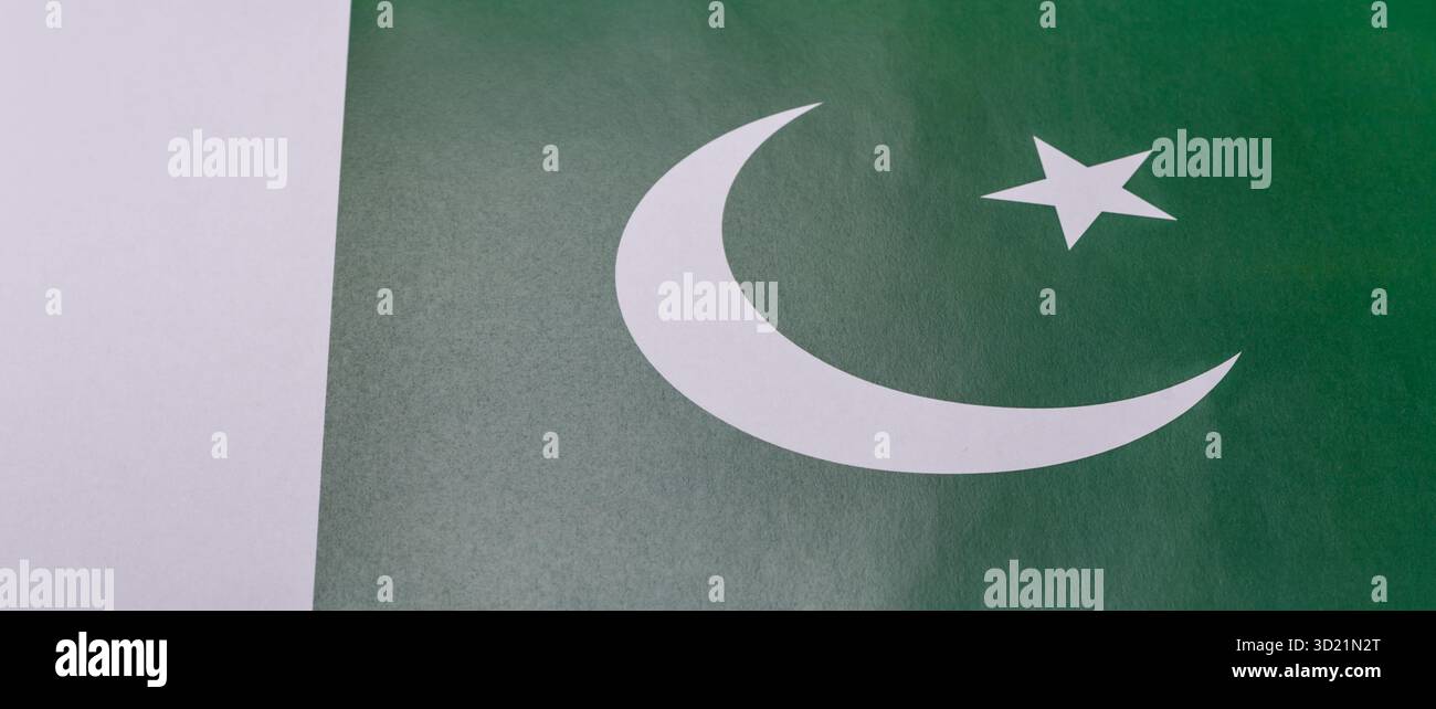 Pakistani flag, white crescent and white star on a green background ...