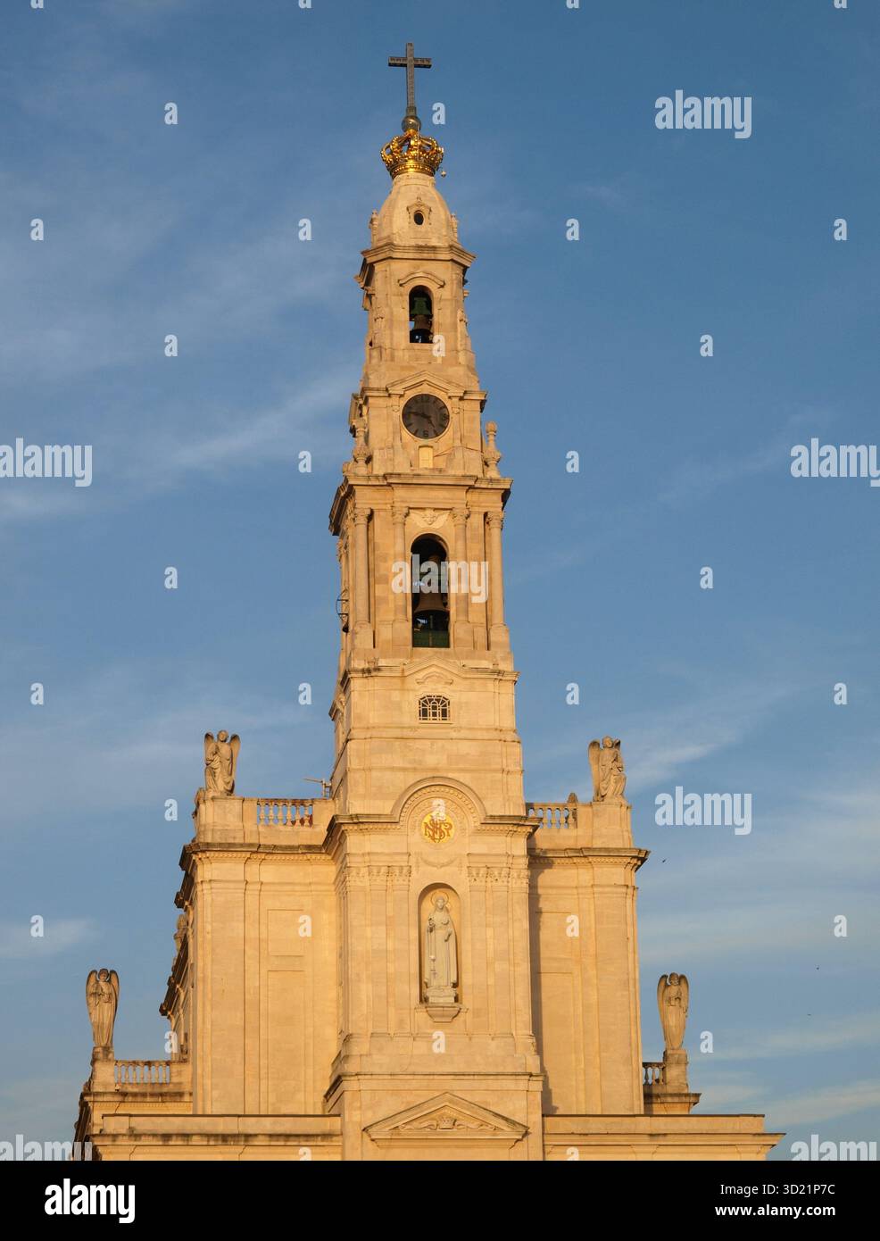 Sanctuary of Fatima bell tower standing tall against blue sky Stock ...