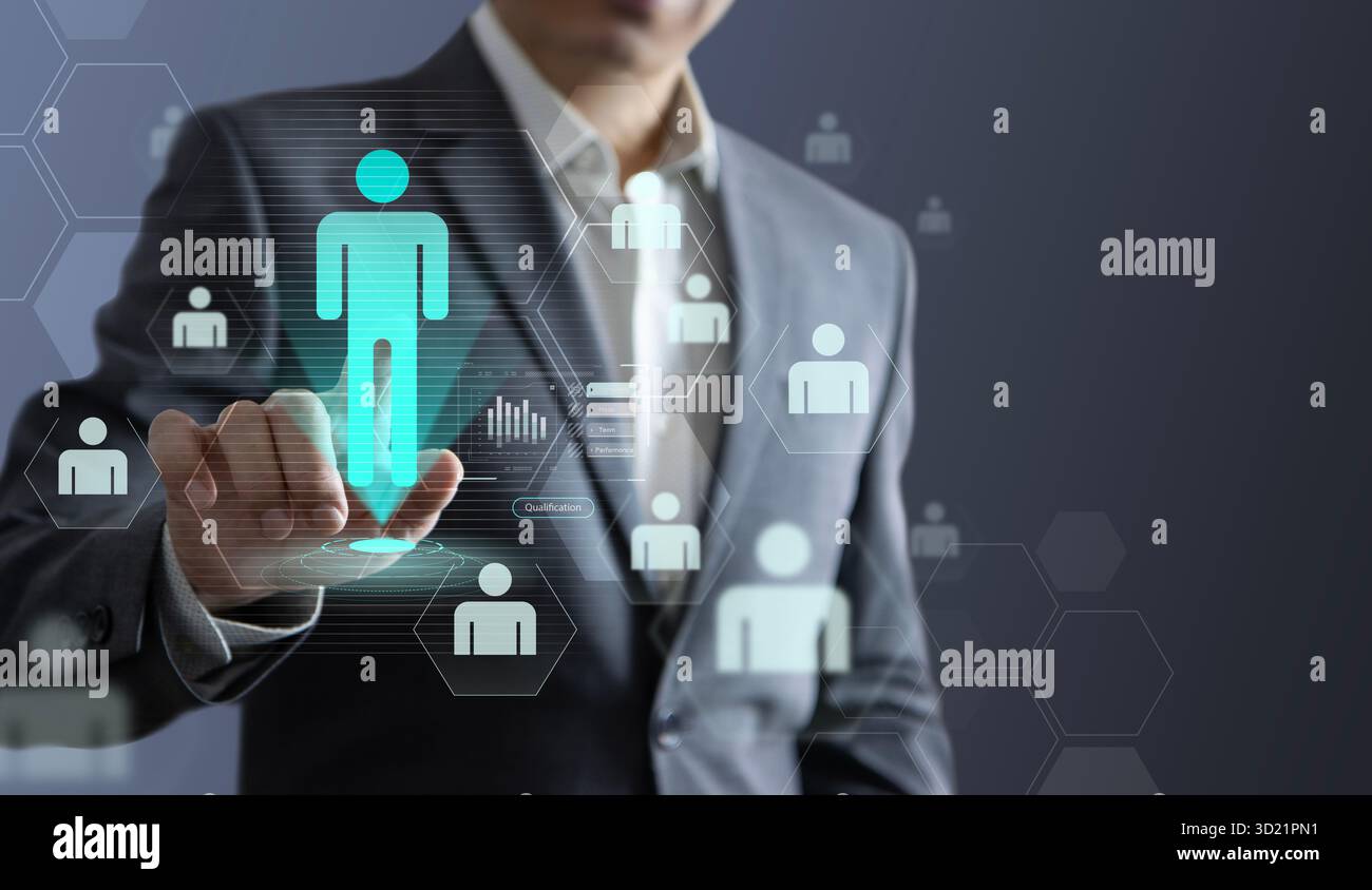 Business administrator interacts with a virtual screen to select the ...