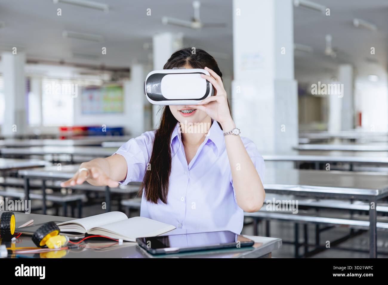 Smart Students teen in uniform learning STEM with VR headset technology ...