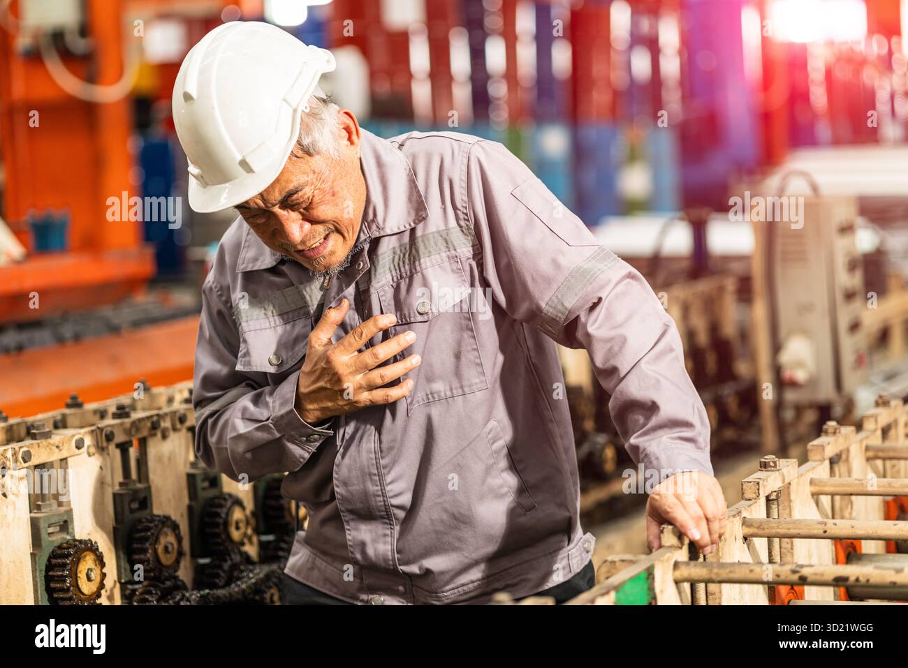 Senior factory worker chest pain suffering from heart attack, heart ...