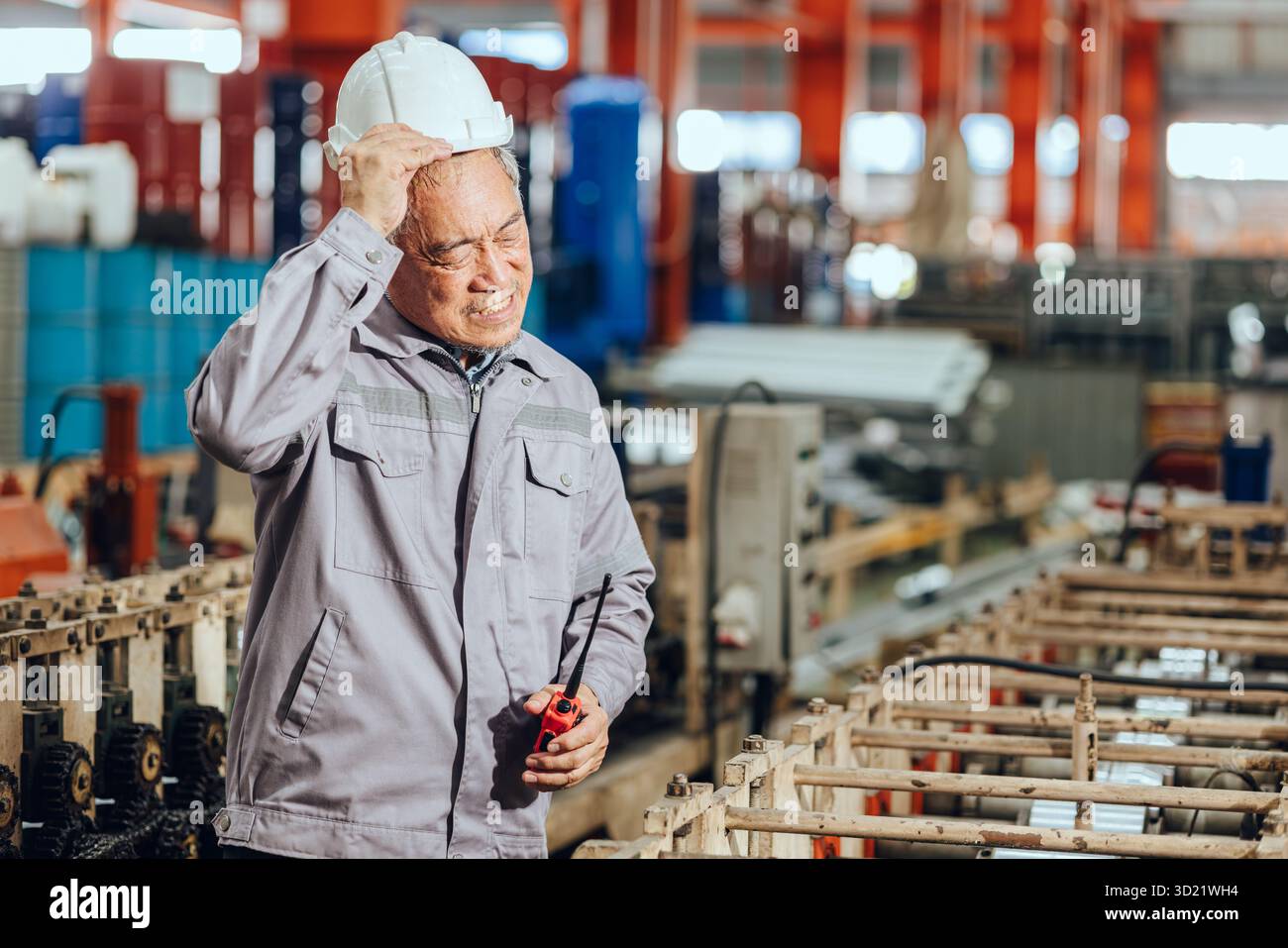 Senior worker headache stressed, feel angry hot uncomfortable hard work ...