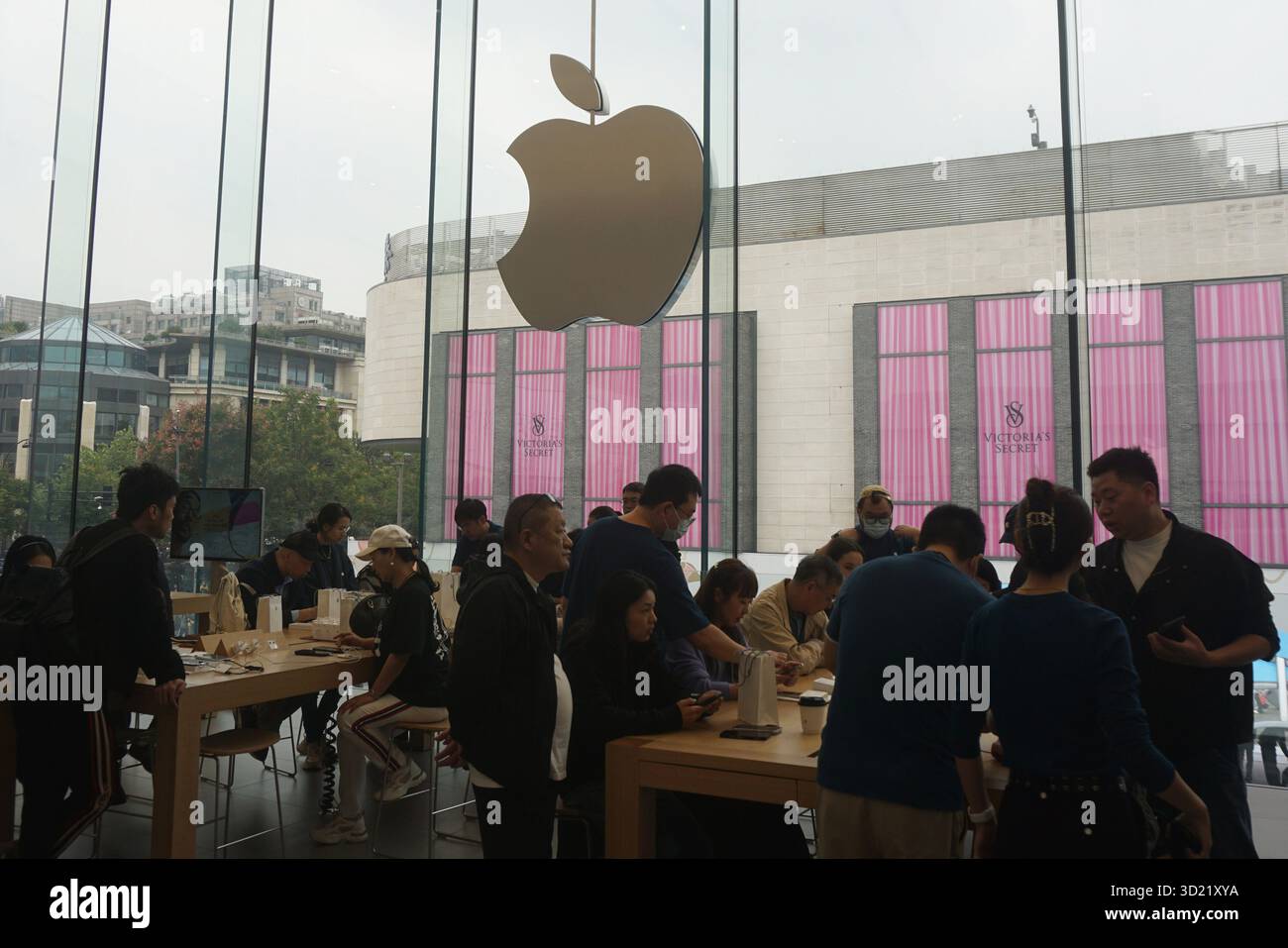 Customers purchase iPhone 17 series phones at the Apple flagship store ...