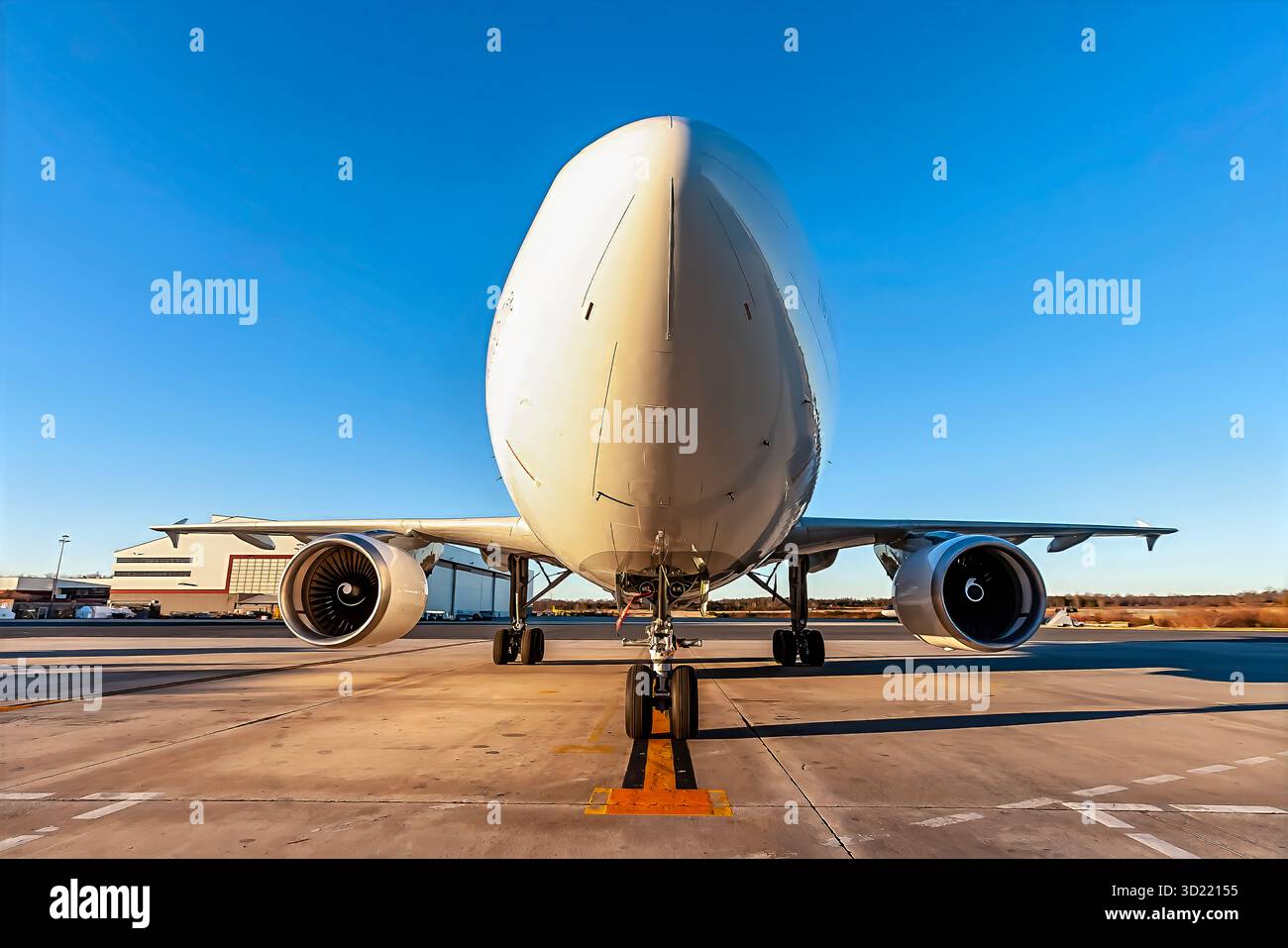 Heavy Lift Ready: Cargo Jet Awaits Loading on Rainy Airport Tarmac ...