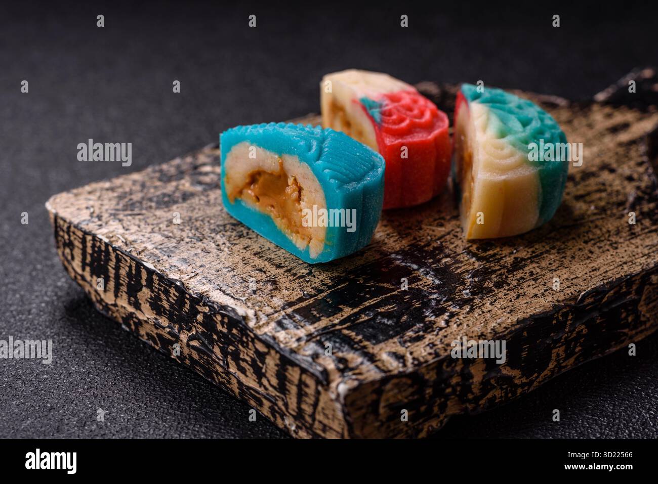 Chinese mooncake is an Asian sweet dessert with a coating of rice dough ...