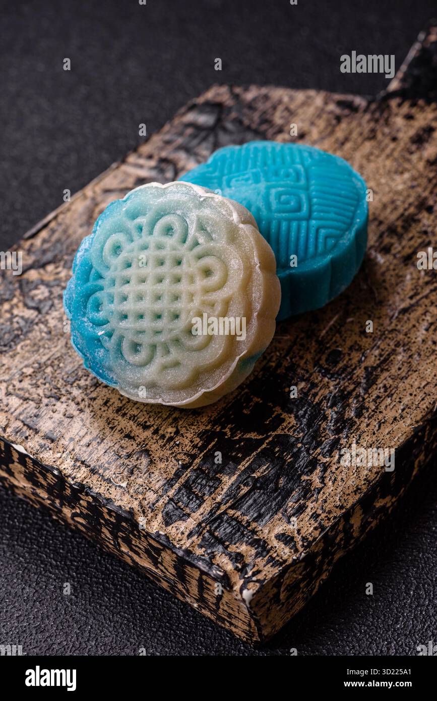 Chinese mooncake is an Asian sweet dessert with a coating of rice dough ...