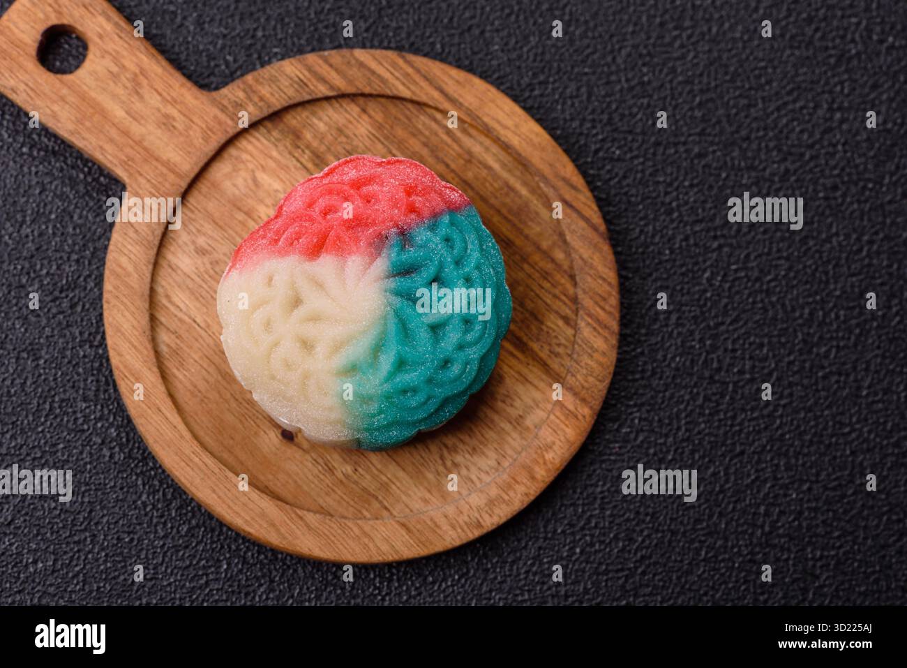 Chinese mooncake is an Asian sweet dessert with a coating of rice dough ...