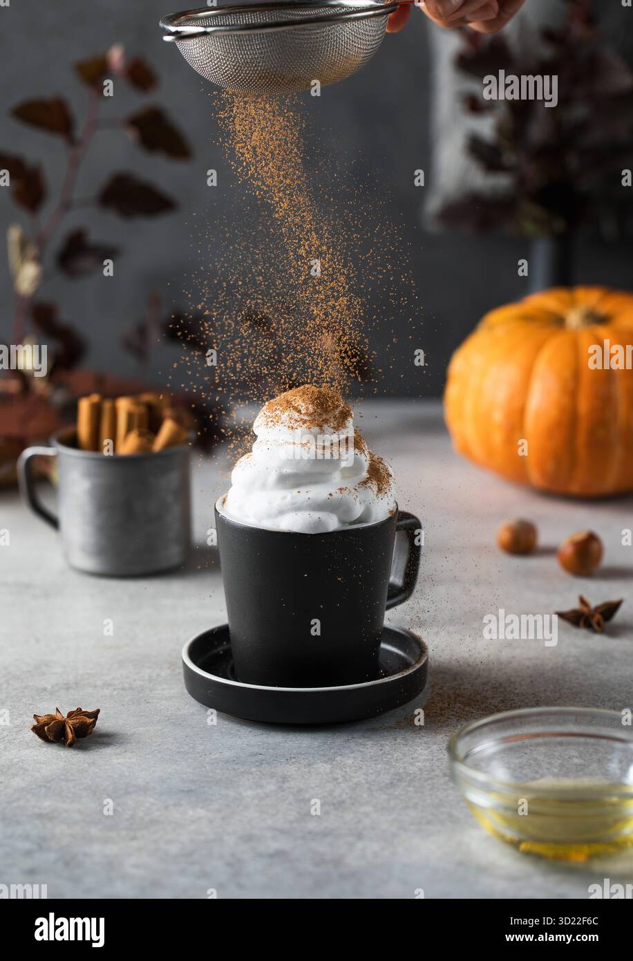 Woman sprinkles cinnamon on hi-res stock photography and images - Alamy