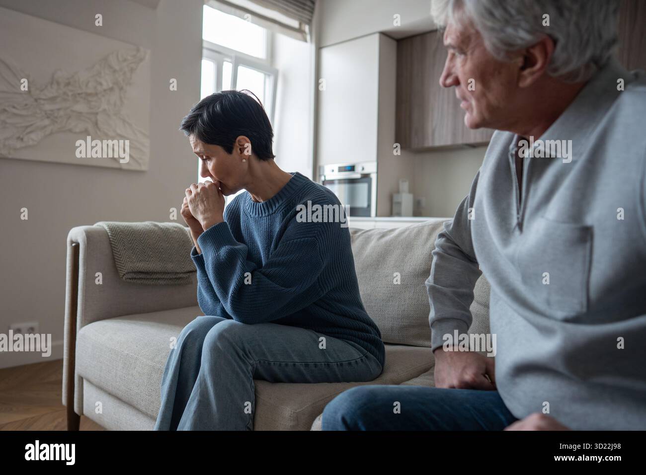Angry hysterical husband with controlling behavior toward scared wife ...