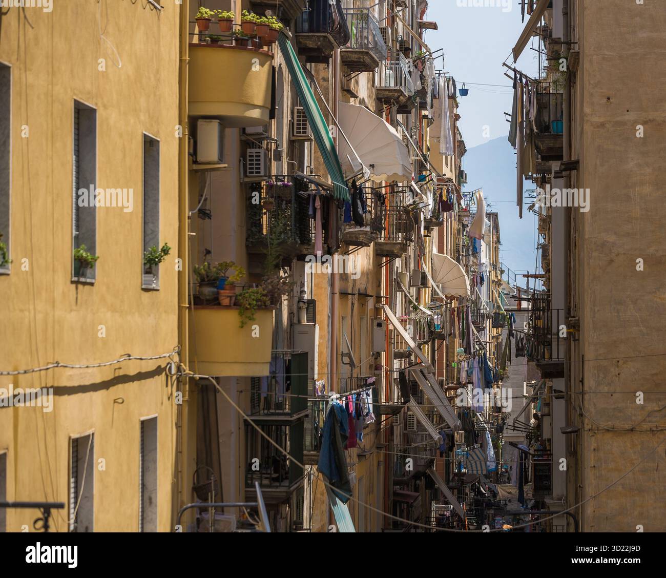 Naples (Italy) - View of narrow alley in Naples with characteristic ...