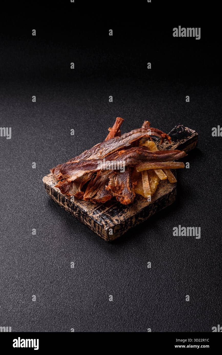Dried salted fish as snacks or jerky, seafood as slices. Dried seafood ...