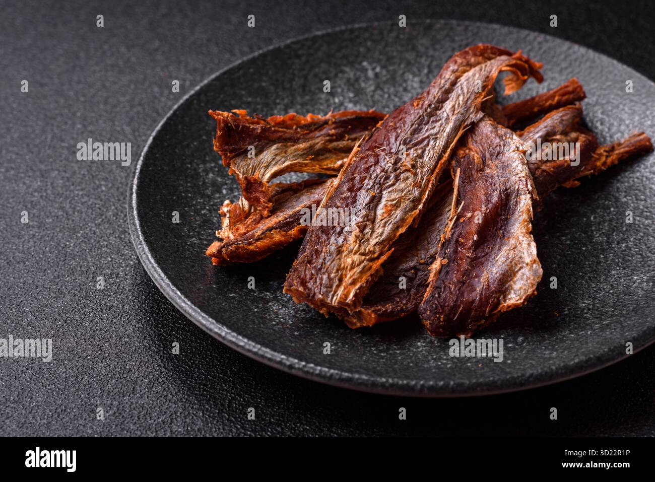 Dried salted fish as snacks or jerky, seafood as slices. Dried seafood ...