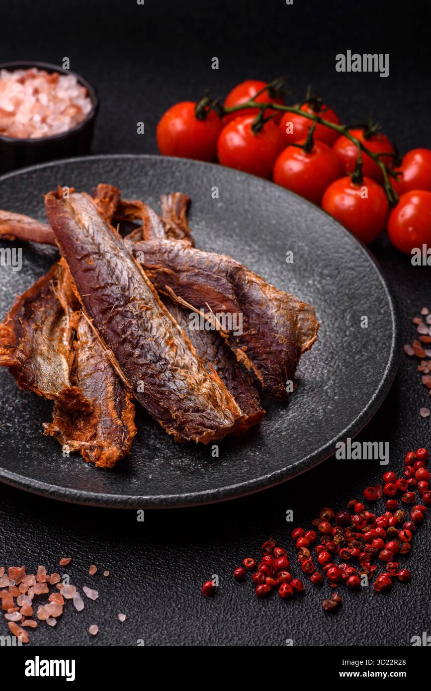 Dried salted fish as snacks or jerky, seafood as slices. Dried seafood ...