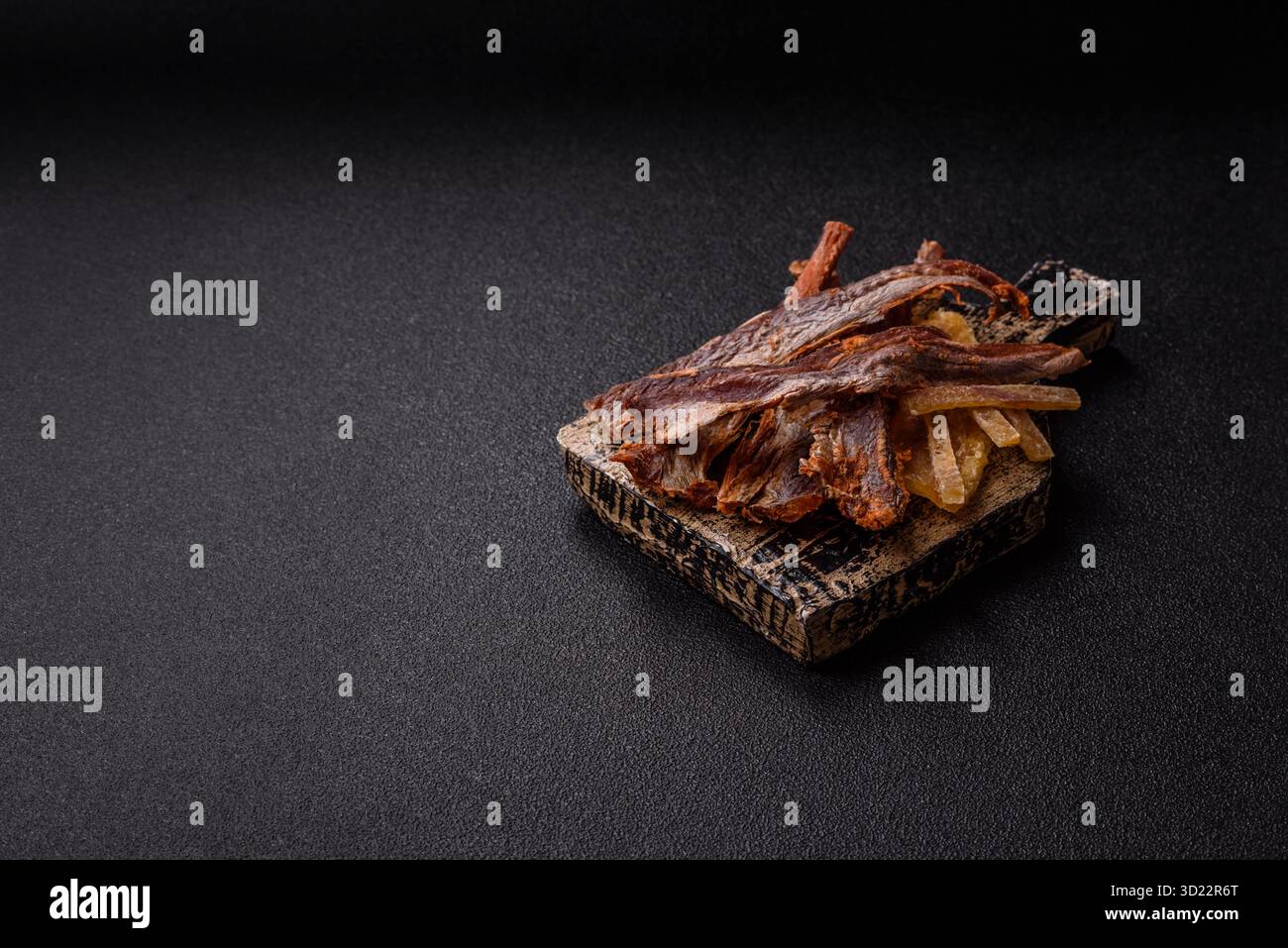 Dried salted fish as snacks or jerky, seafood as slices. Dried seafood ...