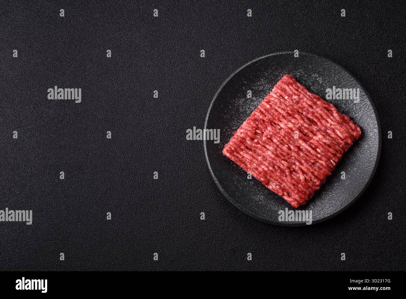 Raw minced beef or pork, ground meat for burgers. Raw minced red as ...