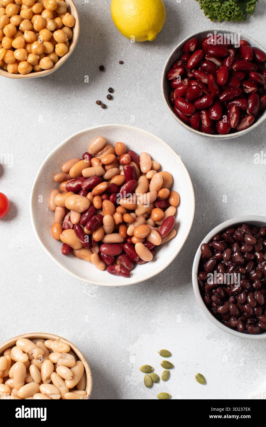 Different types of canned beans in bowls for healthy eating concepts ...