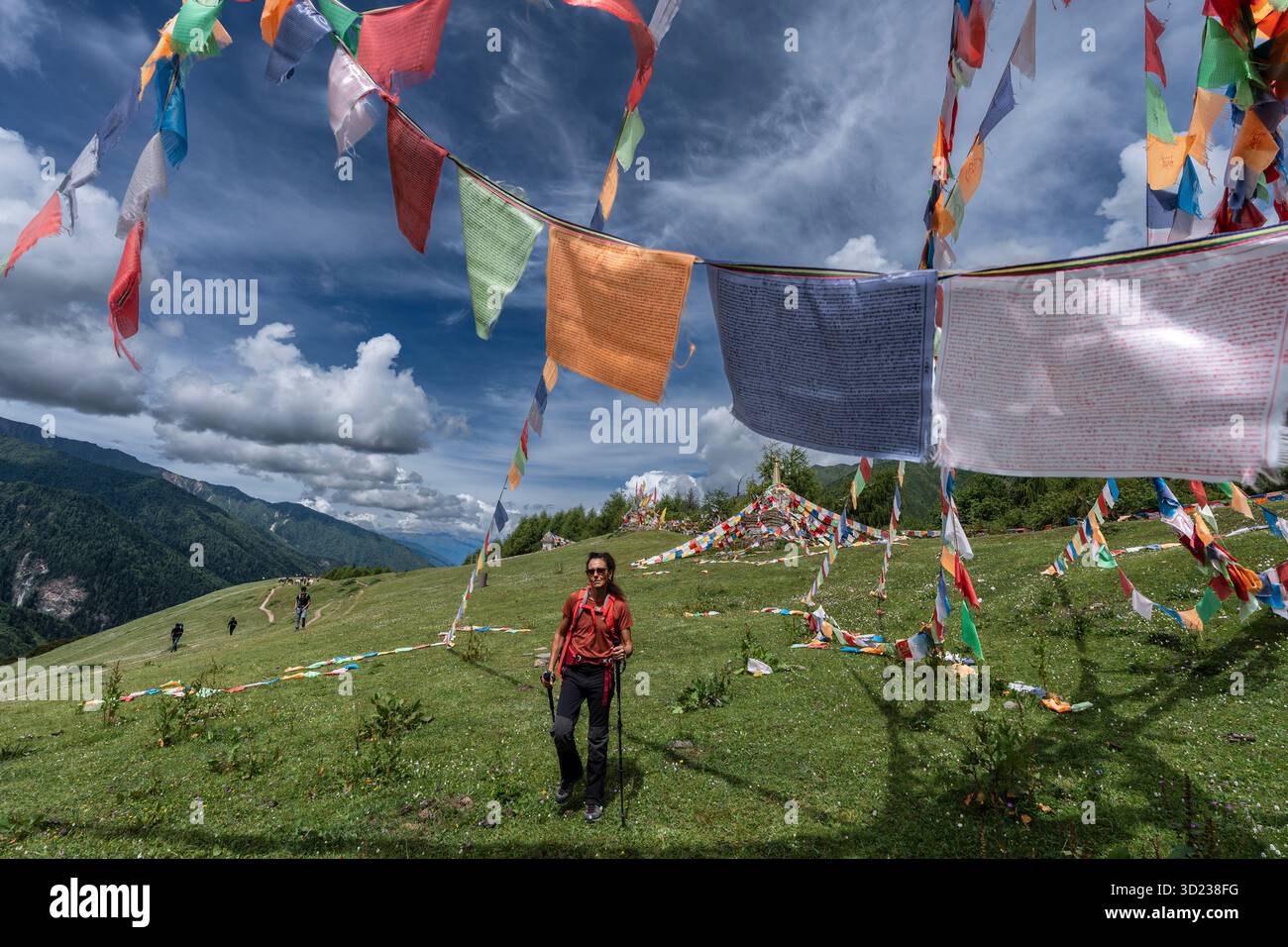 Prayer flags on trek of Haizigou Valley, Mount Siguniang National Park ...