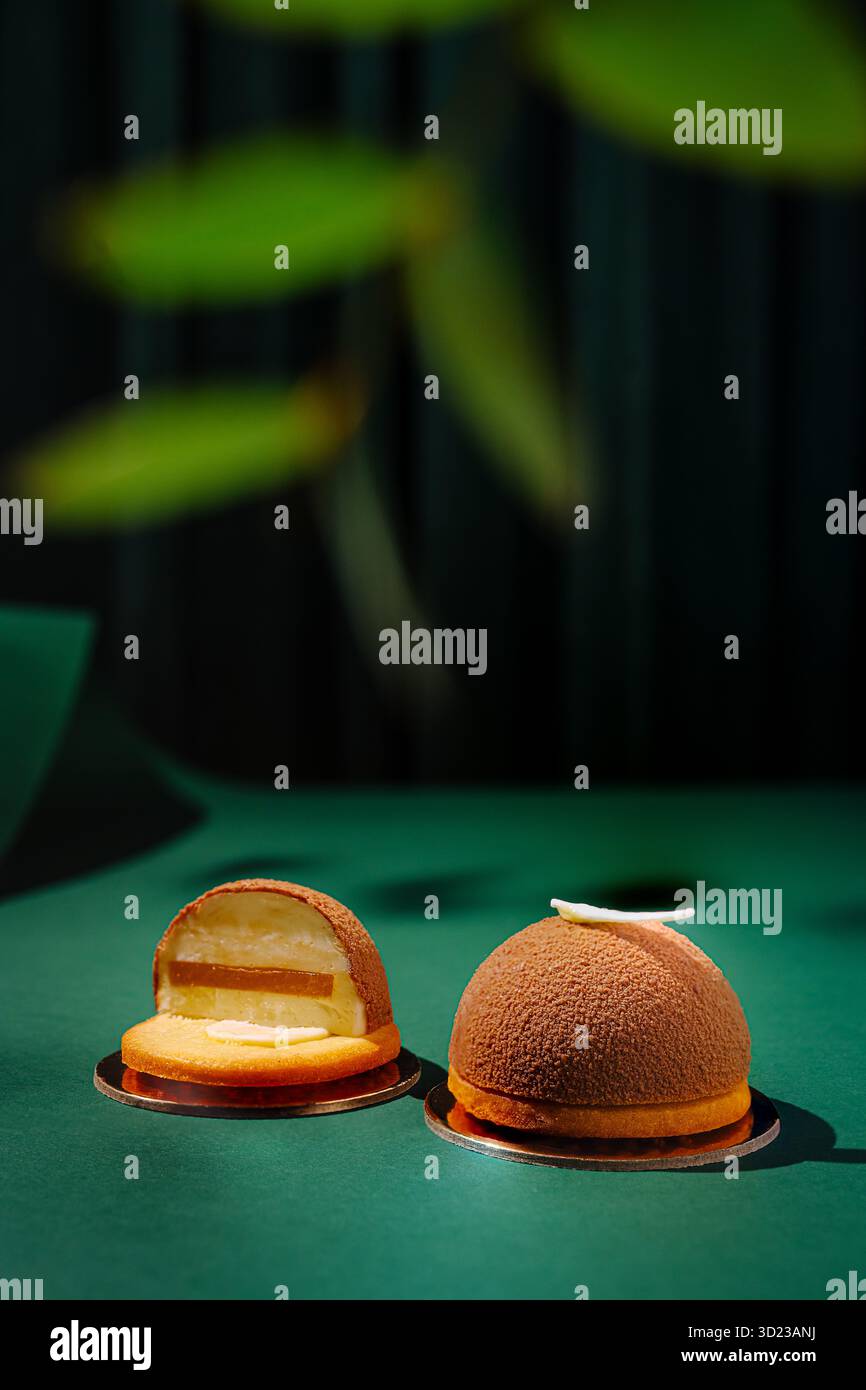Round layered pastry dessert in a studio setting Stock Photo - Alamy